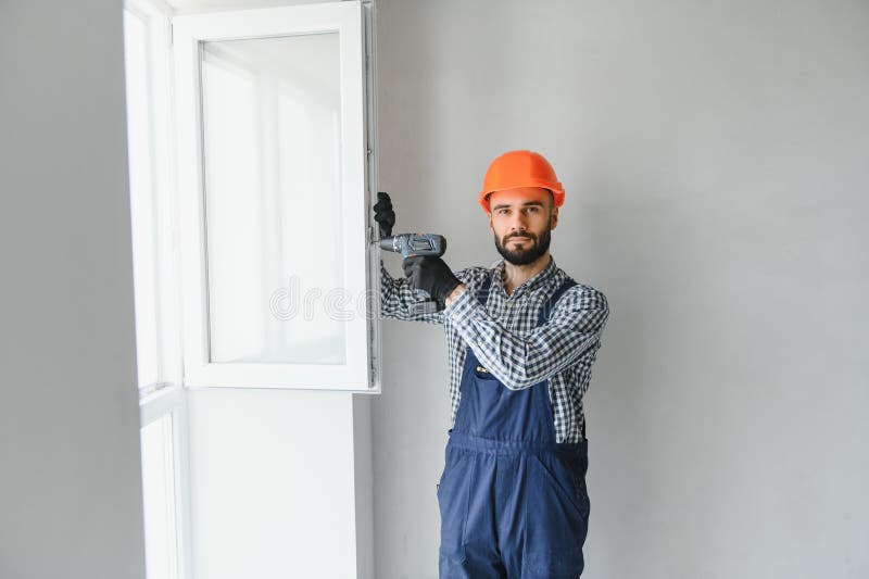 Service Man Installing Window with Screwdriver Stock Image - Image of ...