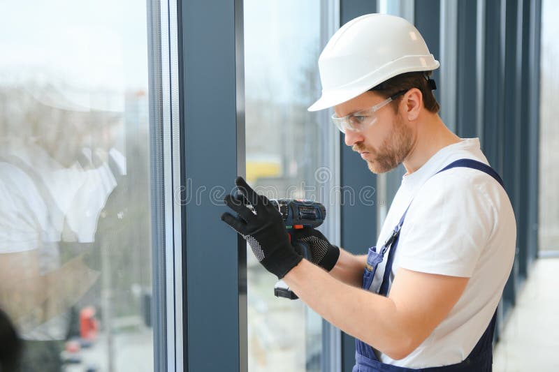 Service Man Installing Window with Screwdriver Stock Image - Image of ...