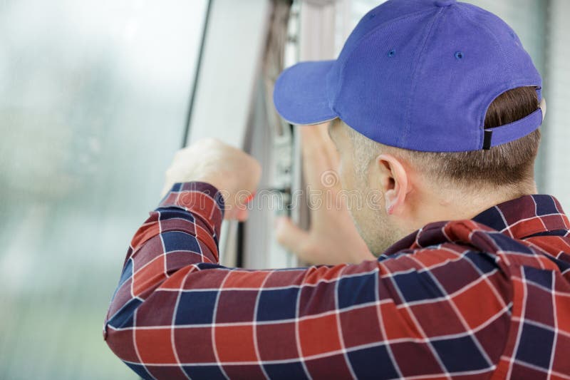 Service Man Installing Window with Screwdriver Stock Image - Image of ... Service Man Installing Window with Screwdriver Stock Image - Image of ...