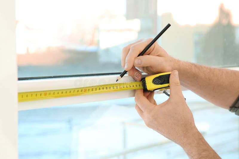 Service Man Measuring Window for Installation Indoors Stock Image ...