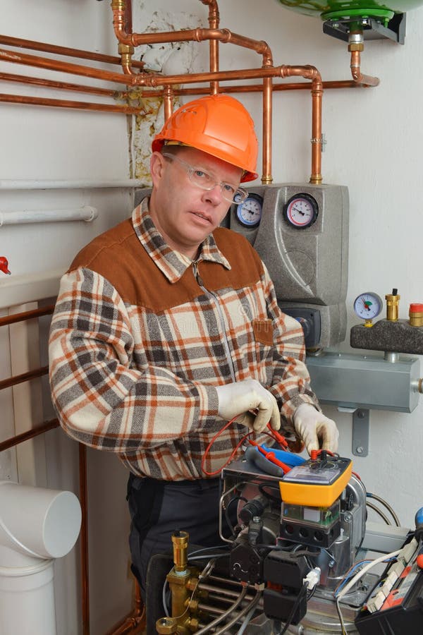 Service Man Working on Furnace Stock Photo - Image of class, hand: 30040516