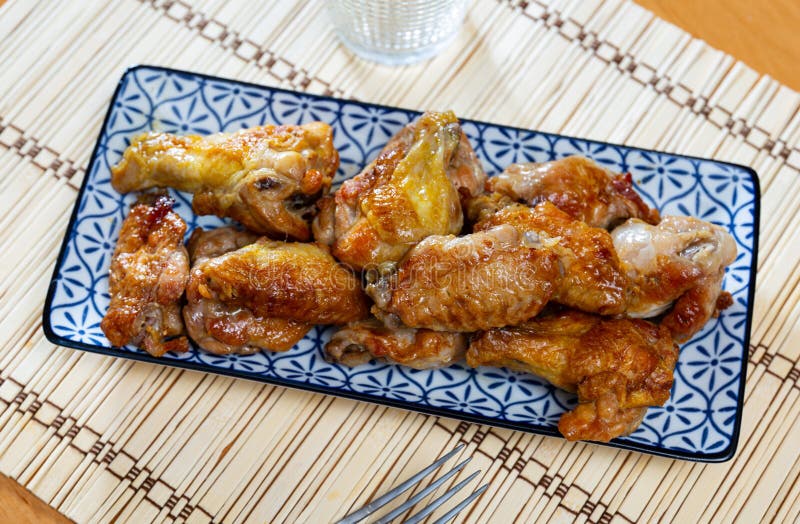 Service Plate Containing Delicious Fried Chicken Wings with Necessary ...