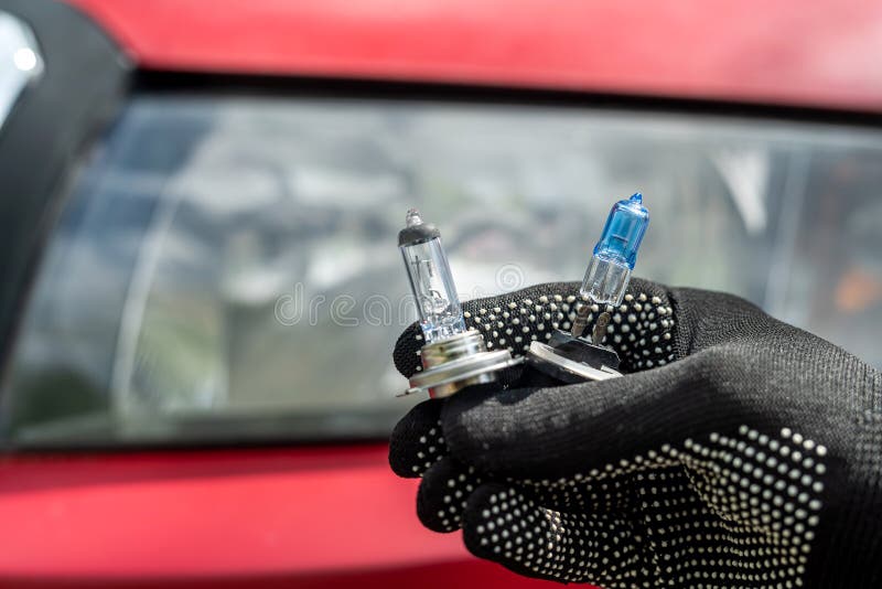 Service Replacement of a Halogen Car Headlight Bulb. Stock Photo ...