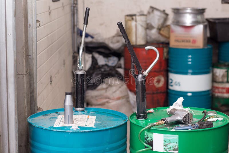 Service Station. Oil Barrel for Car Engine. Stock Photo - Image of room ...