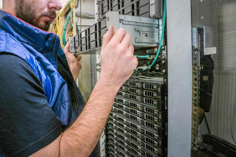 Service Work on the Technical Platform. the Man Replaces the Server in ...