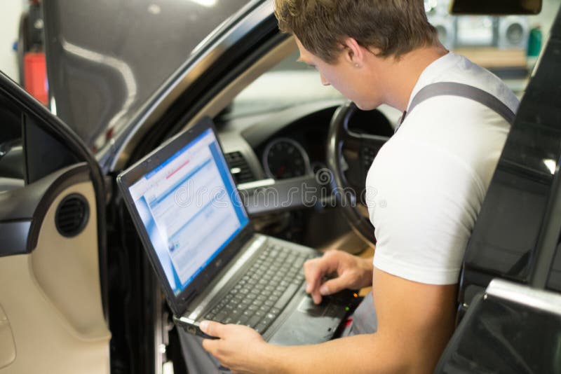 Car Mechanic Working in Auto Repair Service. Stock Image - Image of ...