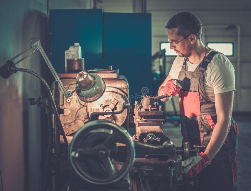 Serviceman in car workshop stock photo. Image of automobile - 48894114