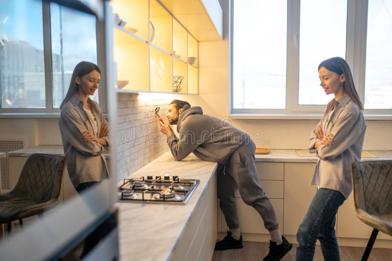 Serviceman Installing the Power Socket on the Kitchen Wall Stock Image ...