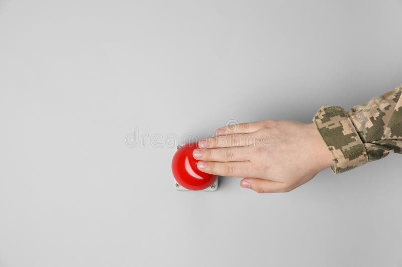 Serviceman Pressing Red Button of Nuclear Weapon at Black Table ...