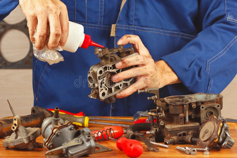 Serviceman Repairing Parts of Automobile Engine in Workshop Stock Image ...