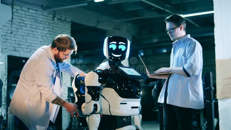 Servicemen Repairing an Android in a Laboratory Stock Footage - Video ...