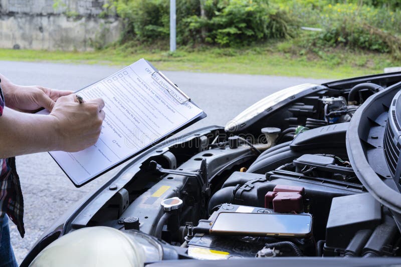 Engine Engineer is Checking the Car. Equipment and Lubricants, H Stock ...