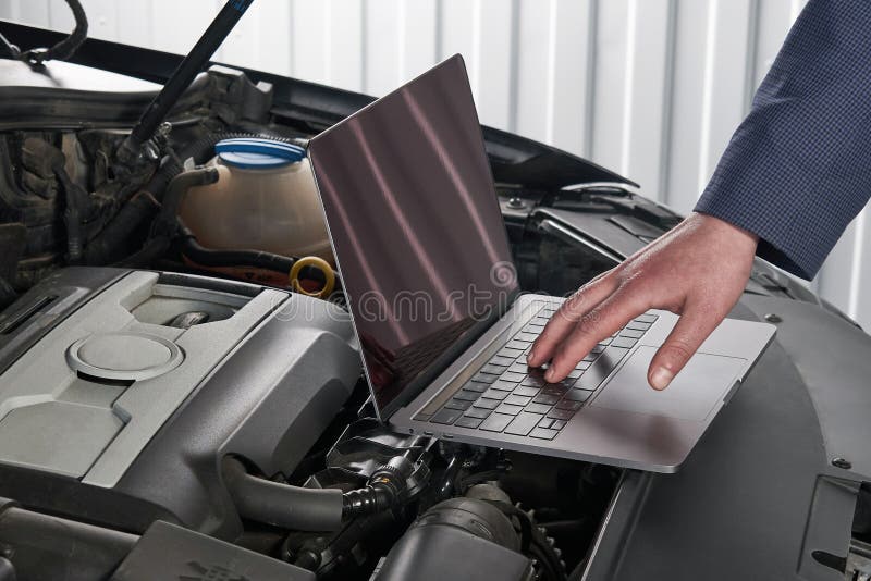 Car Mechanic Using Computer in Auto Repair Shop Stock Image - Image of ...