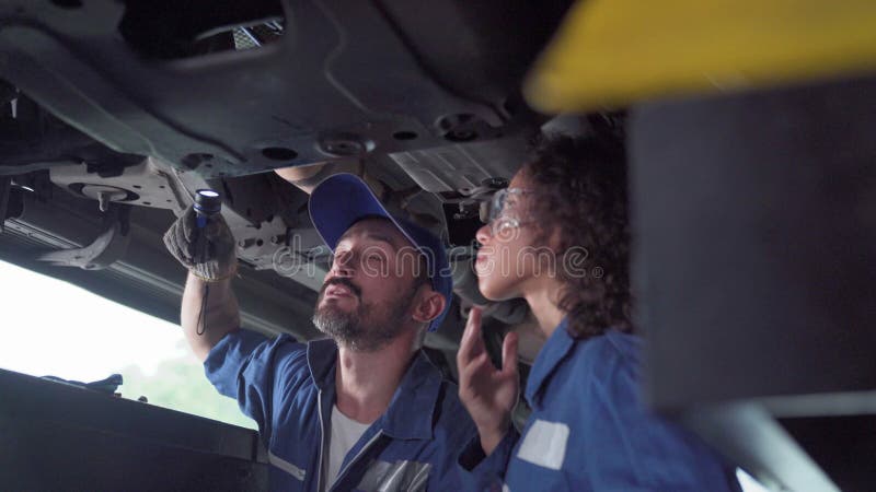 Services Car Engine Machine Concept. Two Mechanics in Uniform are ...