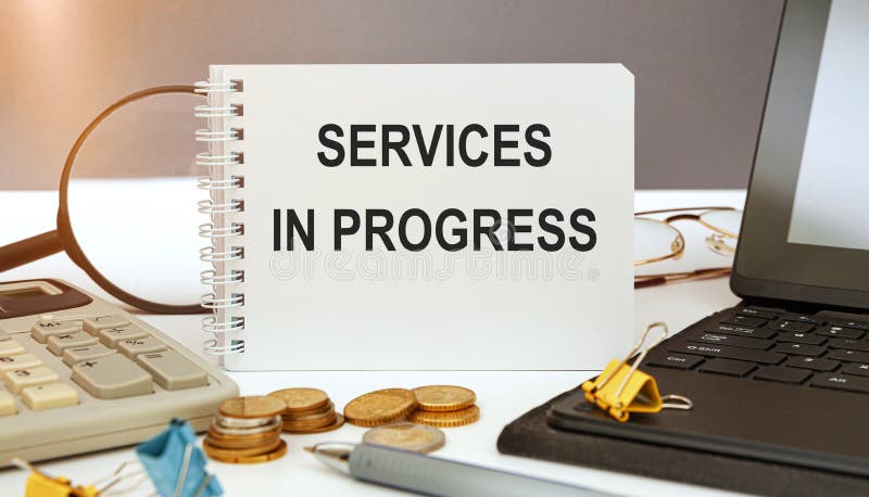 Services in Progress is Written on a Notepad on an Office Desk Stock ...