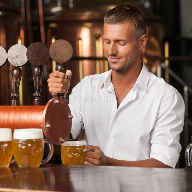 Serving the Best Beer in Town. Handsome Bartender in White Shirt Stock ...