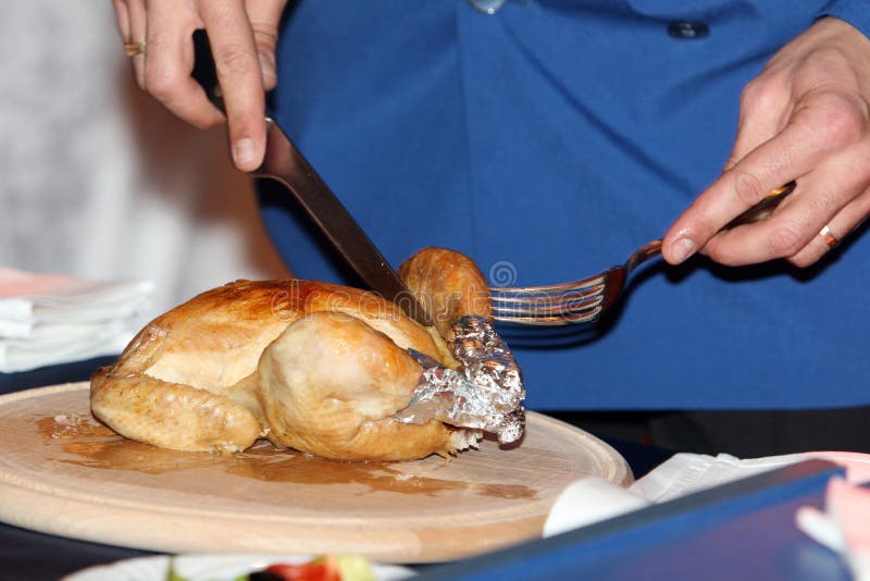 Serving chicken stock image. Image of danger, dexterity - 14733101