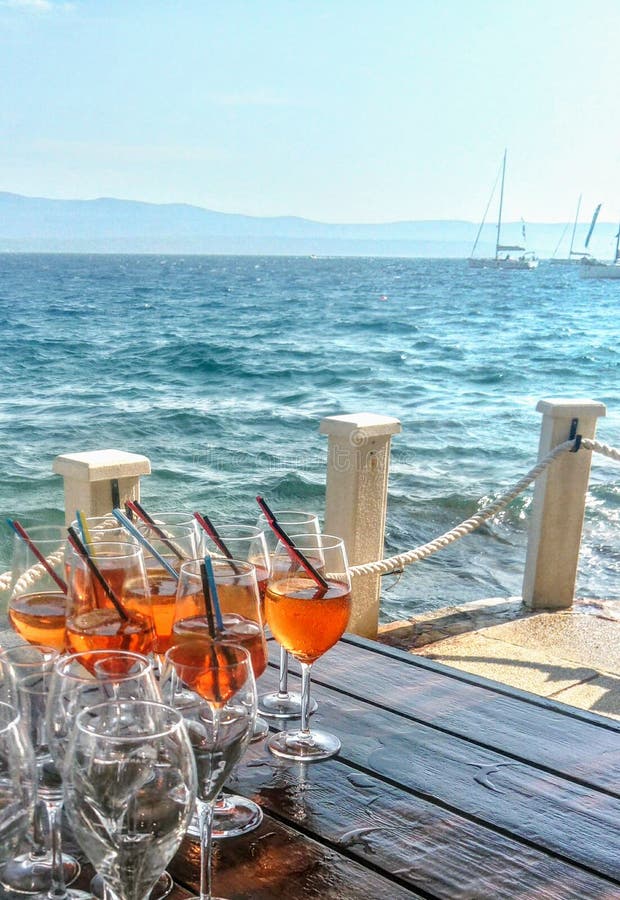 Serving Cocktails by the Sea Stock Photo - Image of cocktails, apples ...