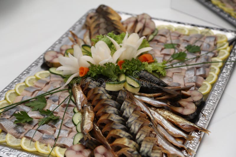 Serving of Delicious Boiled and Fried Assorted Fishes Stock Image ...