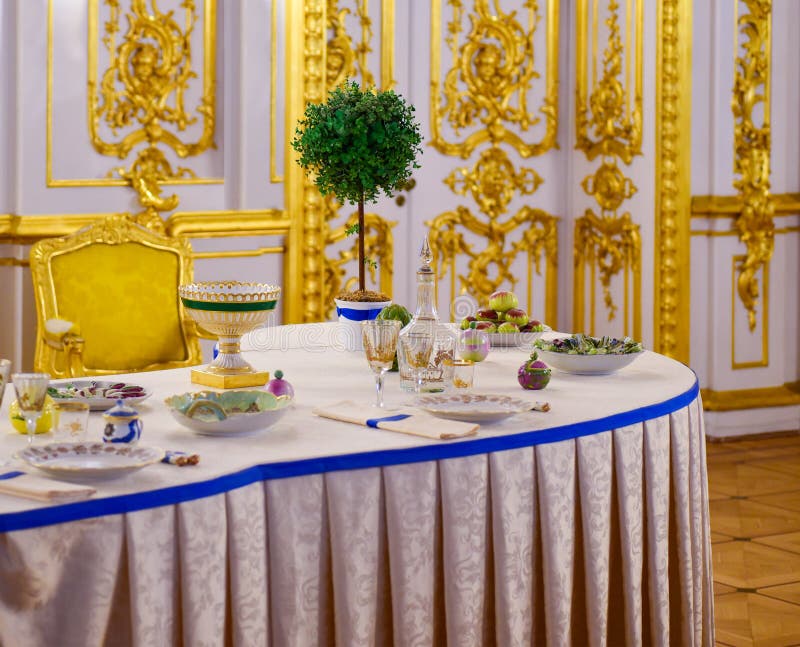 Serving Dining Table in a Golden Royal Interior Stock Image - Image of ...