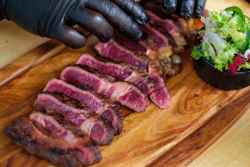 Serving Freshly Cooked Beef Steak on a Wooden Board Stock Image - Image ...