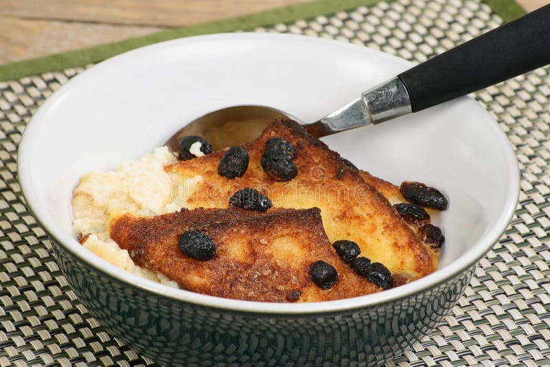 Bread Pudding in Bowl stock photo. Image of golden, dessert - 29716930