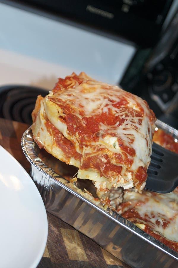Serving lasagna stock photo. Image of closeup, tomato - 48607996