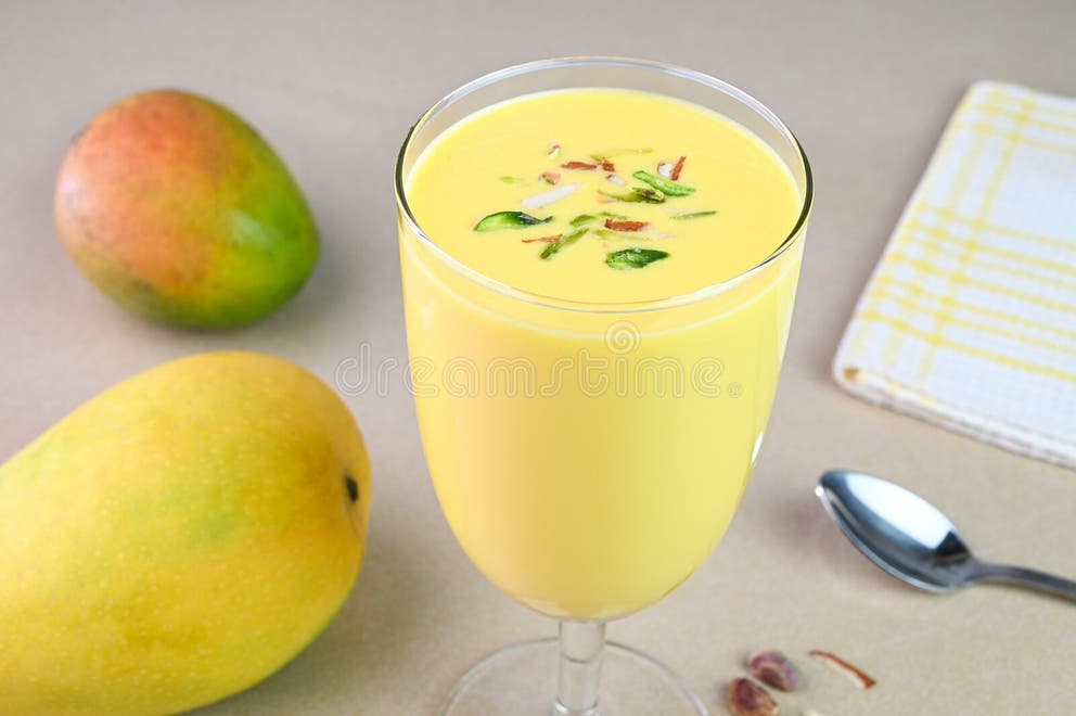 Serving Mango Lassi in a Cup Stock Photo - Image of isolated, almond ...