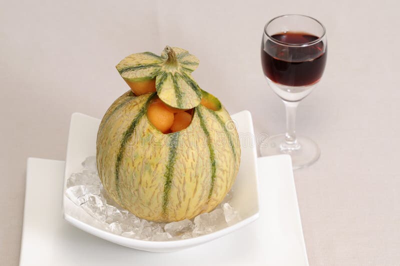 Serving Melon with a Glass of Red Wine Stock Photo - Image of carved ...