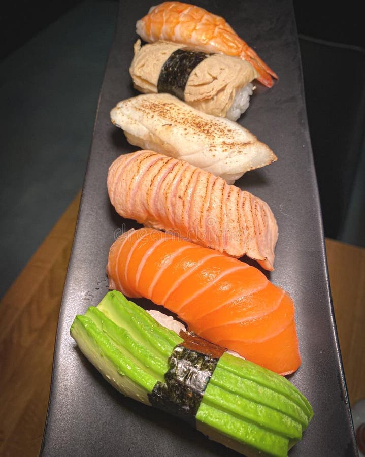 Serving One Plate of Nigiri with Various Variations of Fish Meat Stock ...