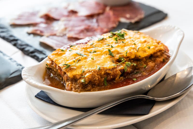 Serving Portion Of Delicious Italian Classic Beef Lasagna Served On Oval Plate Stock Image
