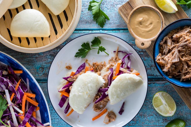 A Serving of Pulled Pork Stuffed and Steamed Bao Buns, Ready for Eating ...