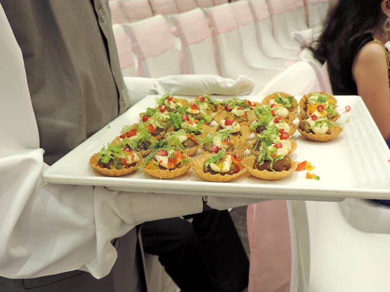 Serving Starters during Wedding Reception Stock Image - Image of waiter ...