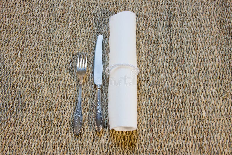 Serving of Table from a Napkin Stock Photo - Image of pearls, twisted ...