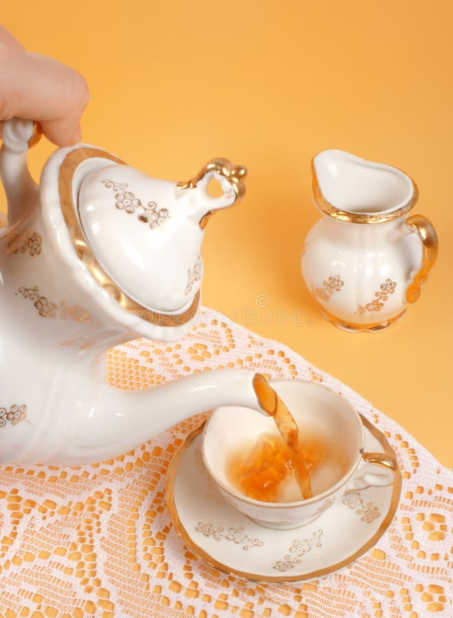 Serving tea stock photo. Image of orange, beverage, pretty - 564878