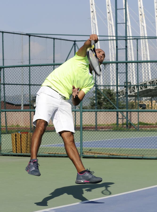 Serving a tennis ball stock photo. Image of competition - 19510550