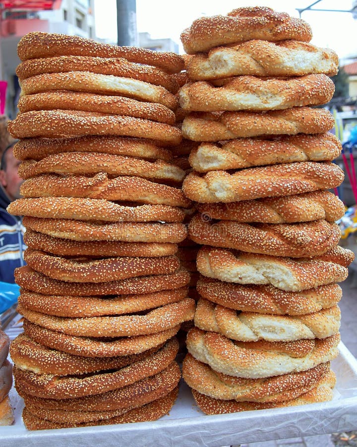 Sesame round buns pile stock photo. Image of bakery, kulouri - 46120536