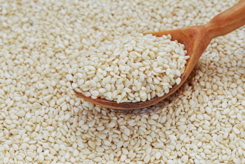 Sesame seed in spoon stock image. Image of close, spice - 88974611