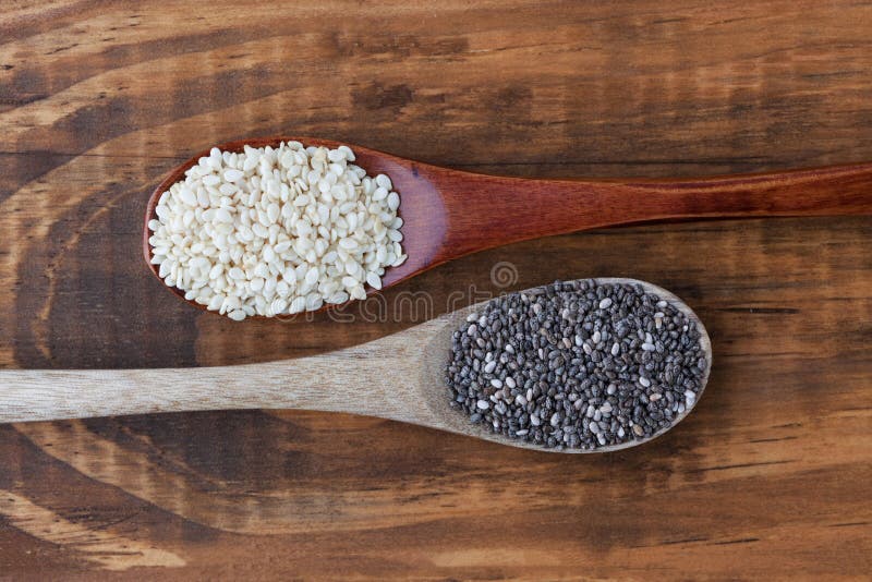 Sesame Seeds and Black Chia Seeds in Wooden Spoons Stock Image - Image ... Sesame Seeds and Black Chia Seeds in Wooden Spoons Stock Image - Image ...