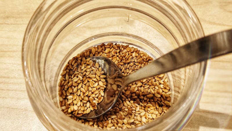 Sesame Seeds Inside the Jar with Teaspoon Stock Photo - Image of sesame ...