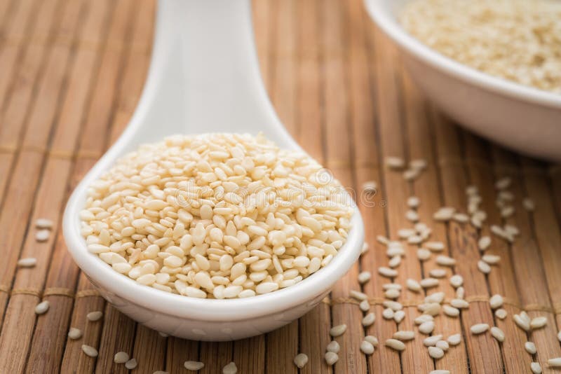 Sesame seeds on spoon stock photo. Image of diet, sesame - 56709652