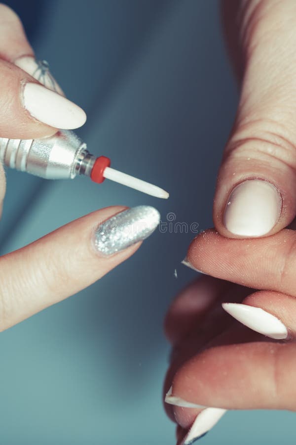 A Session of a Hardware Manicure in the Salon, Processing by a Mill ...