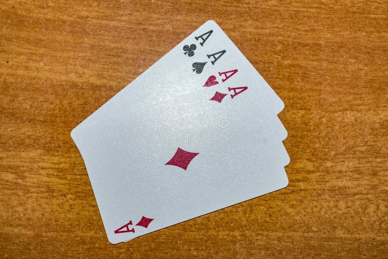 A Set of All Four Nos of Ace of Playing Card Laying on the Table with ...