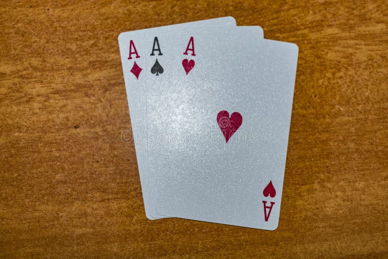 A Set of All Four Nos of Ace of Playing Card Laying on the Table with ...