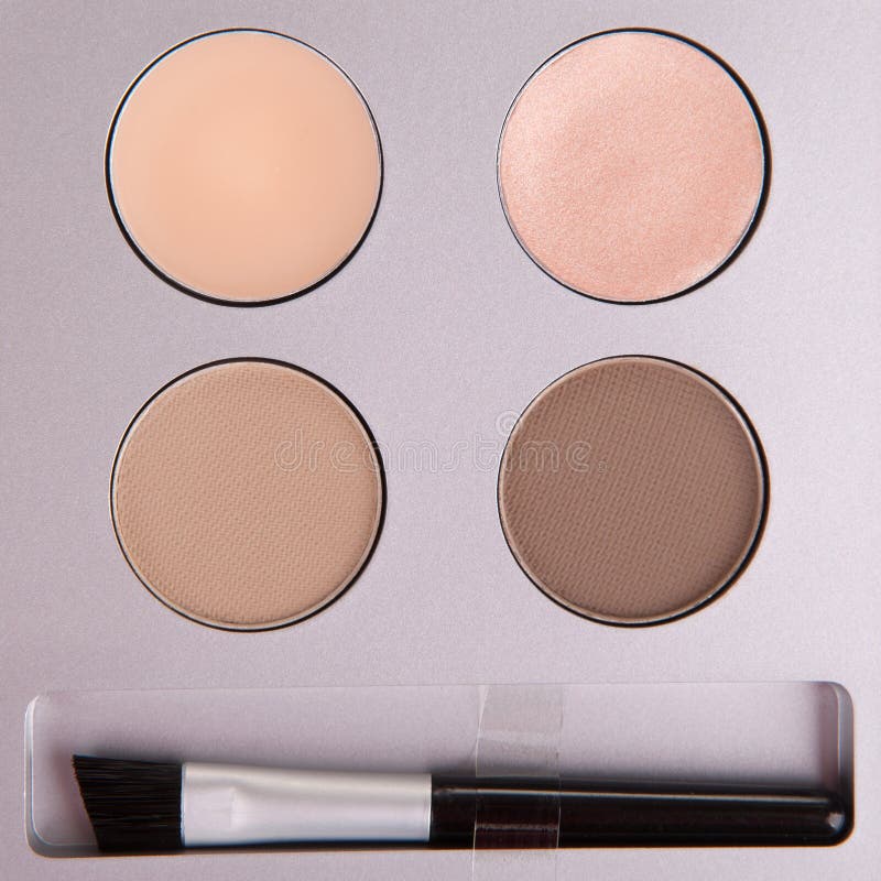 Set of beige eyeshadows stock photo. Image of application - 31015850