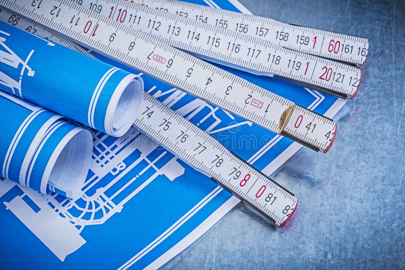 Set of Blue Engineering Drawings Wooden Meter on Metallic Backgr Stock ...