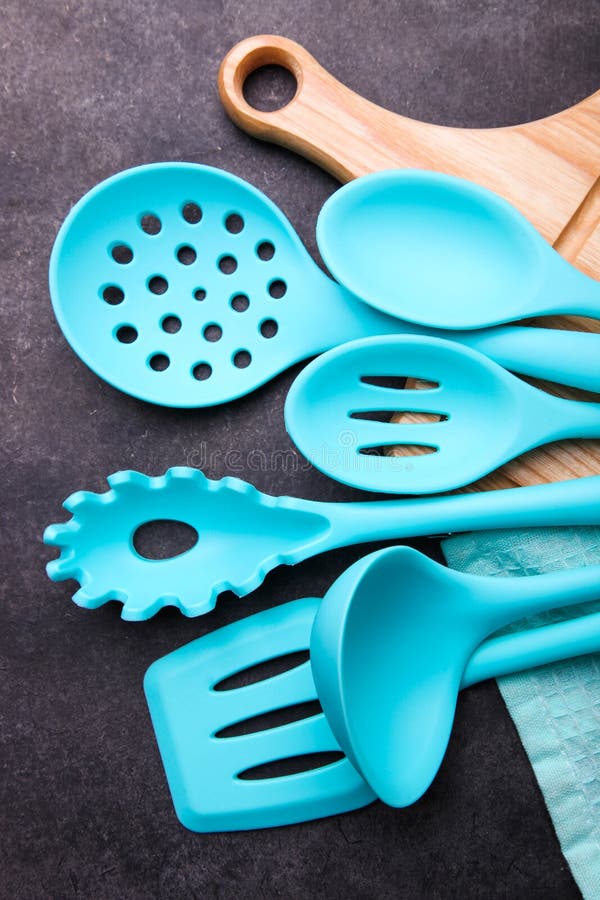 Set of Blue Nylon Kitchen Utensils and Cutting Board Stock Image ...