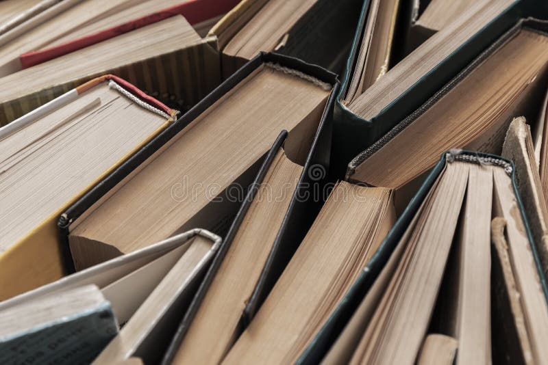 A Set of Books of Different Sizes Lying on the Floor Stock Image ...