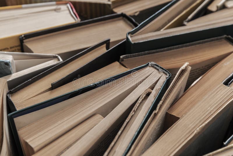 A Set of Books of Different Sizes Lying on the Floor Stock Photo ...