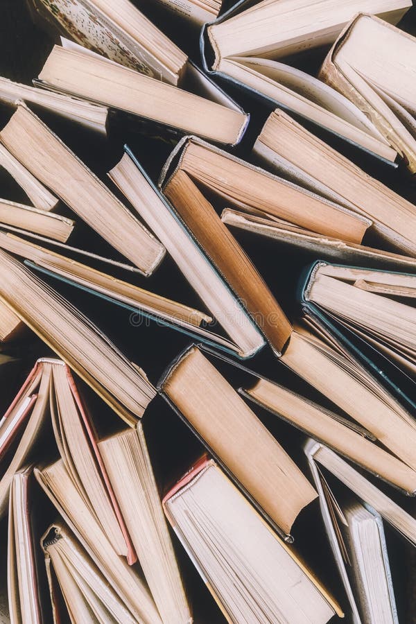 A Set of Books of Different Sizes Lying on the Floor Stock Image ...